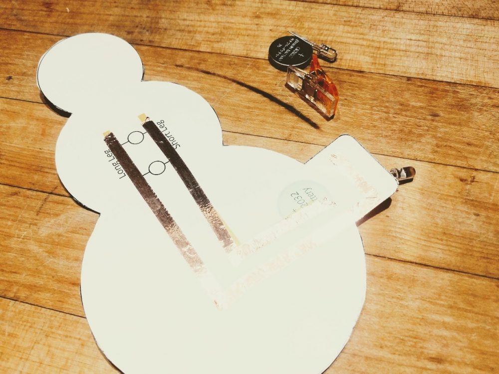 A paper circuit snowman makes great holiday decorations for kids